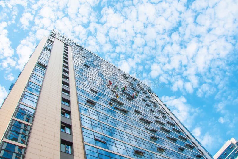 Climbers Clean Windows from the Outside of the Building Washing the ...
