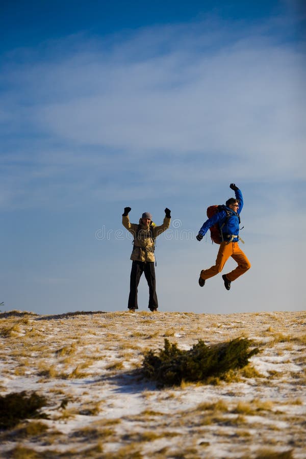 Climbers jumping for joy. stock image. Image of fitness - 79024517