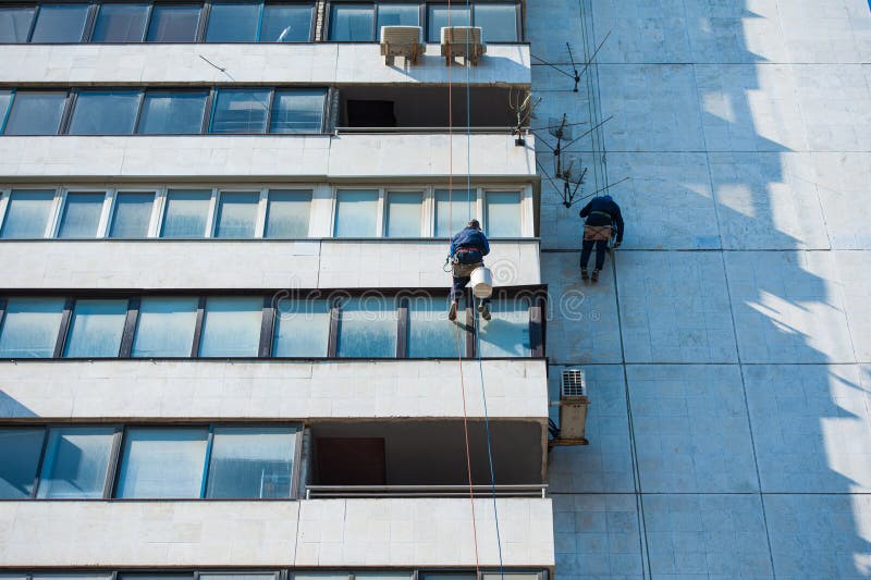 Climbers Perform Construction Work Editorial Image - Image of outside ...