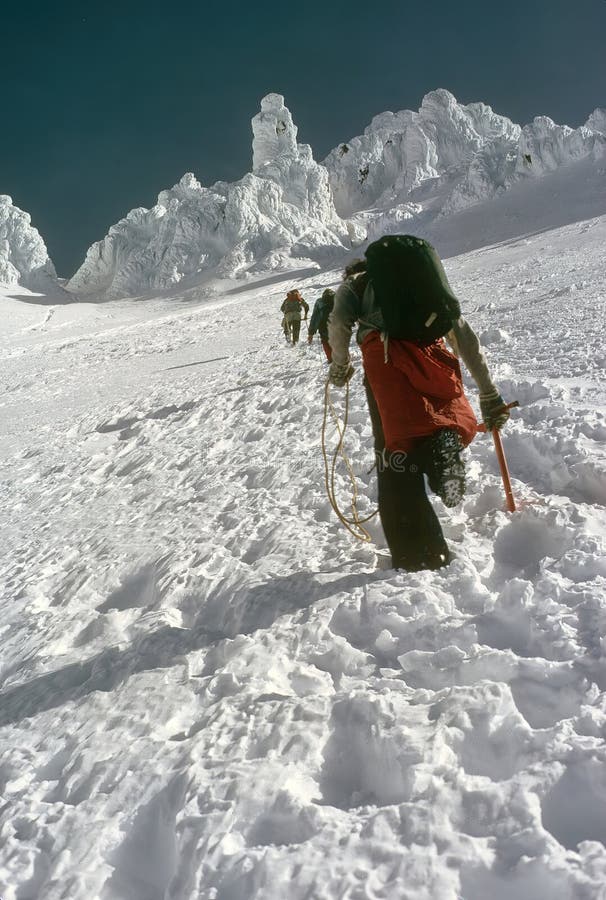 Climbers on steep snow stock photo. Image of mountain - 4856316