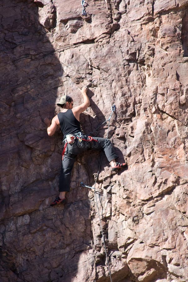 Climbing on the Edge of Shadow Stock Image - Image of skies, canyon ...