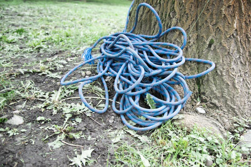 Climbing Equipment on the Ground. Climbing Rope Rolled Up , Copy Space ...