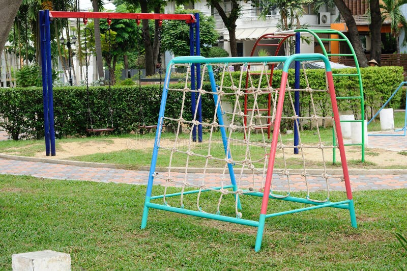 Climbing Net and Chain Swing at Playground. Stock Photo - Image of ...