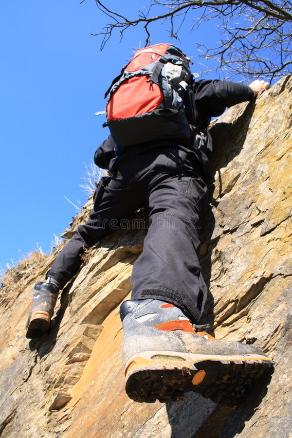 Climbing on a rock stock image. Image of mountaineering - 2208065