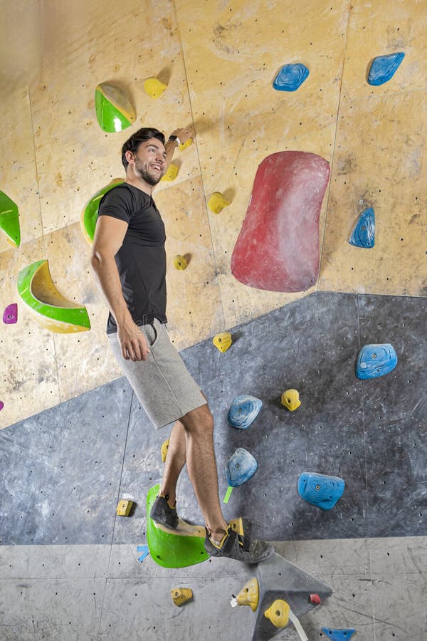 Climbing Sport Ideas. Rock Climber Man Hanging on a Bouldering Climbing ...
