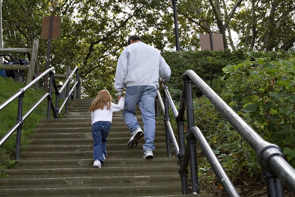 Climbing Stairs stock photo. Image of father, stairway - 1300026