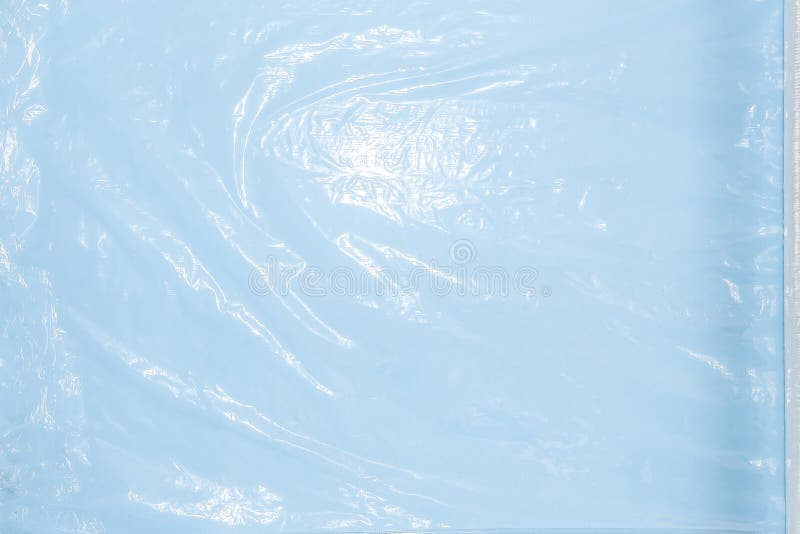 Cling Film on a Blue Background. Stock Image - Image of protection ...