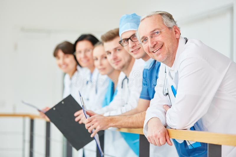 Clinic Team of Doctors Share High Five Stock Photo - Image of success ...