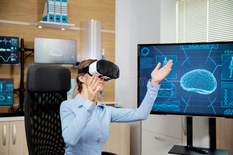 Clinical Neurology Worker Explores Virtual Reality in the Lab Stock ...
