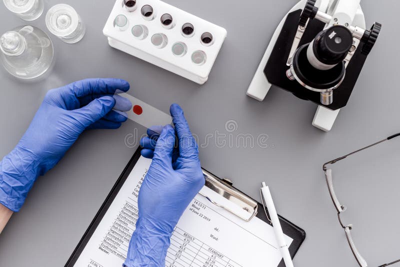 Microscope with Hand Holding Flask, Young Woman Scientist or Chemist ...