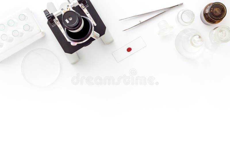 Clinical Science Research with Microscope. Hand Writes Test Results on ...