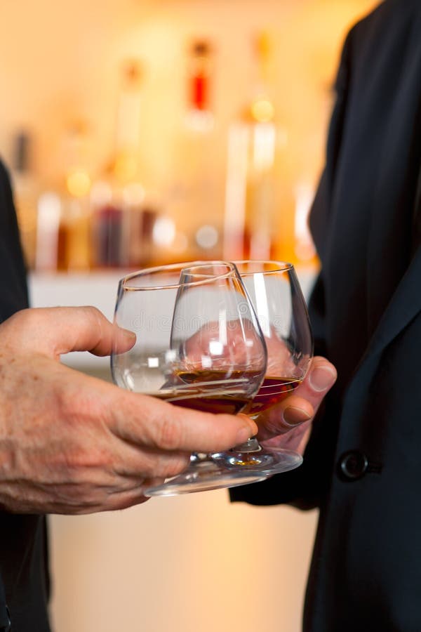 Clinking Glasses with Fine Brandy. Stock Photo - Image of spirits ...
