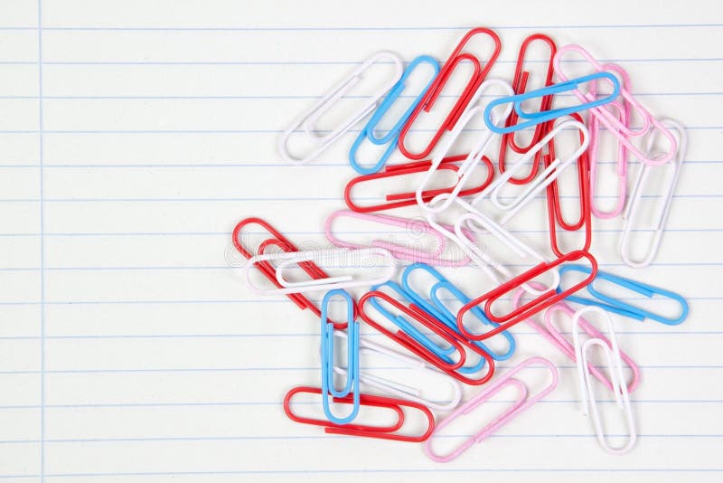 Clip on a sheet of paper. stock image. Image of color - 26183581