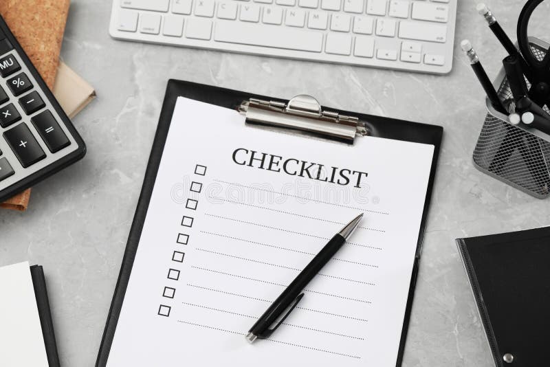 Clipboard with Inscription Checklist and Pen on Grey Marble Table ...