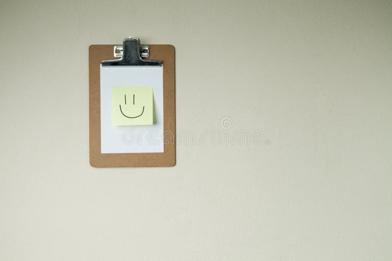 Clipboard with Post it Notes and Smile on the Wall. Stock Photo - Image ...
