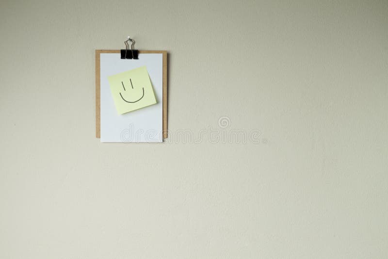 Clipboard with Post it Notes and Smile on the Wall. Stock Image - Image ...