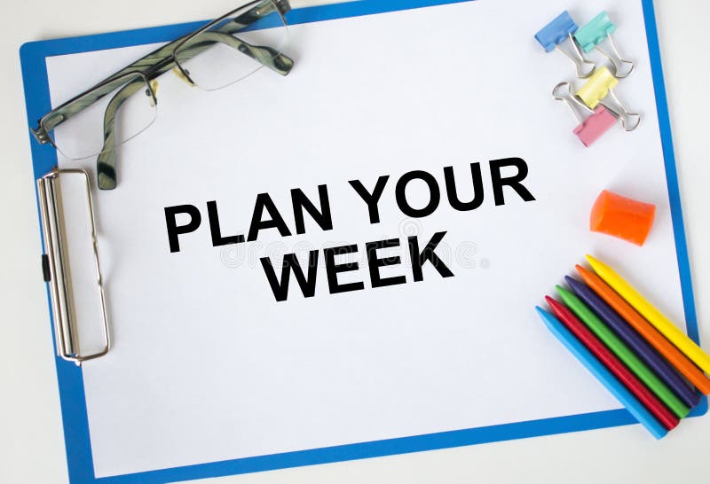 A Clipboard with Text Plan Your Week Eyeglasses Paper Clips Stock Photo ...