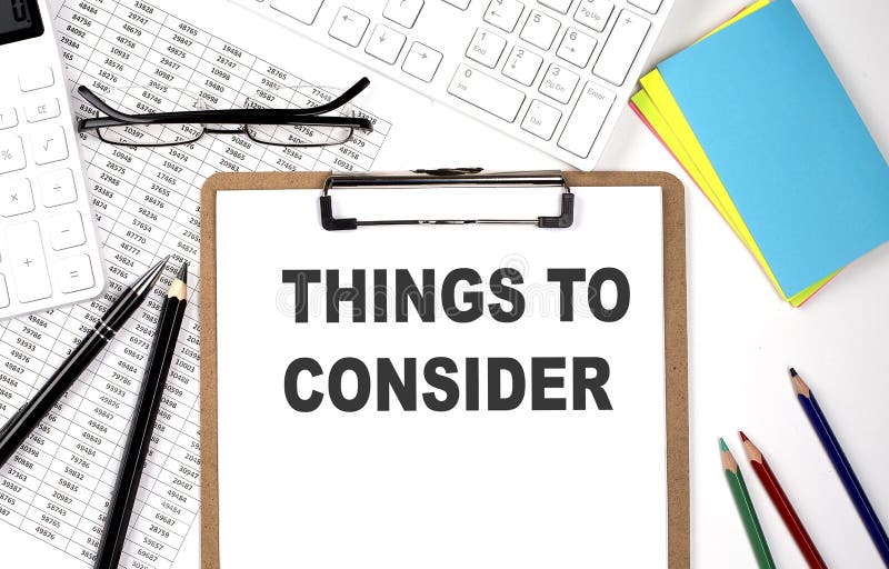 Clipboard with Text THINGS TO CONSIDER and Keyboard and Chart on White ...