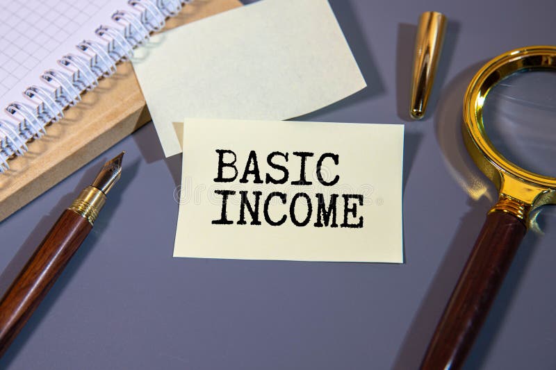 Clipboard with White Blank Paper Text BASIC INCOME Stock Image - Image ...