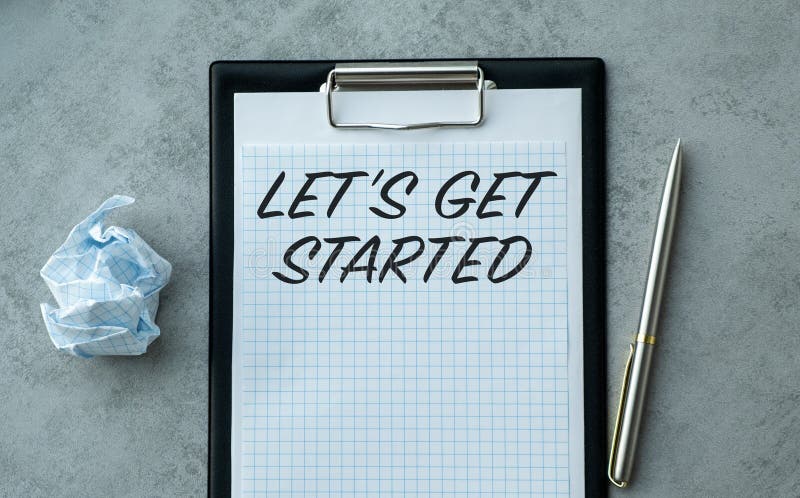 A Clipboard with the Words Let S Get Started Written on it Stock Photo ...