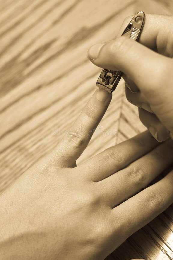 Clipping Finger Nails stock photo. Image of pleasure - 14564114