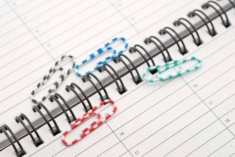 Clips Scattered on a Notebook Stock Image - Image of notice, paper ...