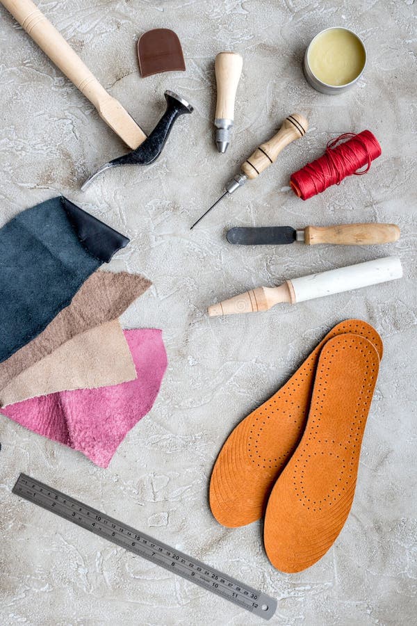 Clobber Preparing His Tools for Work. Grey Stone Desk Background Top ...