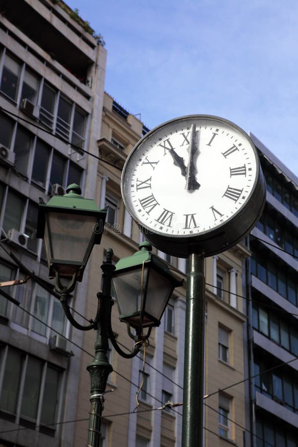 Clock stock image. Image of scene, exterior, lamp, sunlight - 13030029