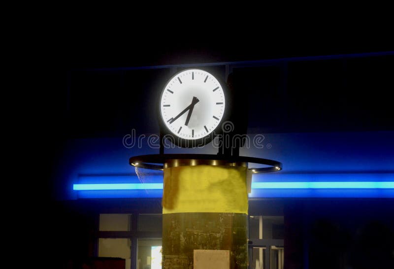 Clock Above a Cylinder-shaped Poster Surface with Lighting. Large ...