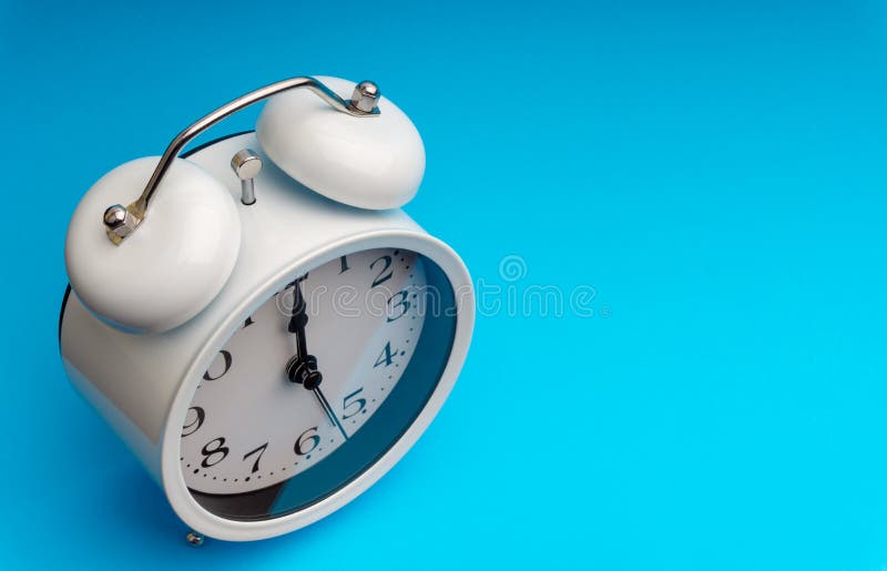 Clock on blue background stock image. Image of concept - 128827667