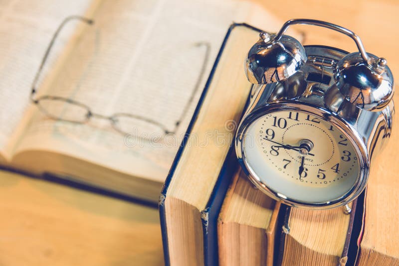 Clock and book stock photo. Image of read, design, morning - 83884848