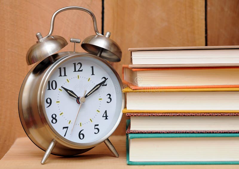 Clock with books stock image. Image of bell, paper, clock - 30782533
