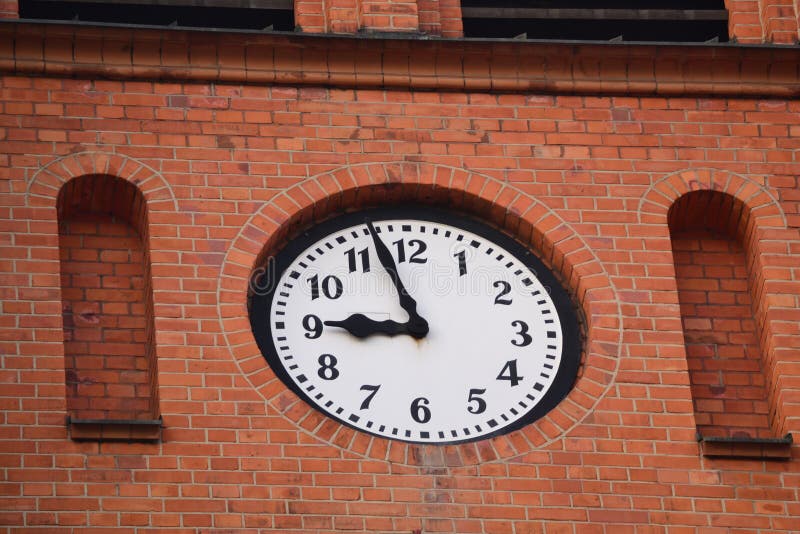 Clock in a brick house stock photo. Image of time, brick - 39428210