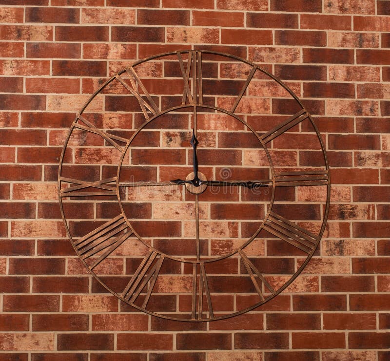 Clock on the brick wall stock photo. Image of white - 114532058