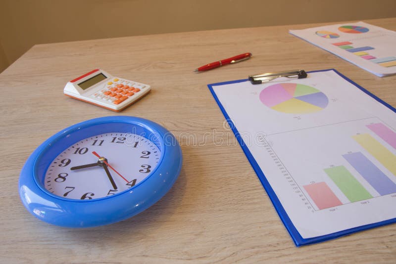 Clock, Calculator, Pen, Graphics on Table. Audit and Business Concept ...