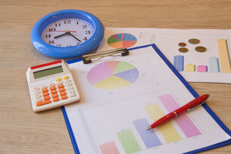Clock, Calculator, Pen, Graphics on Table, Small Change. Audit and ...