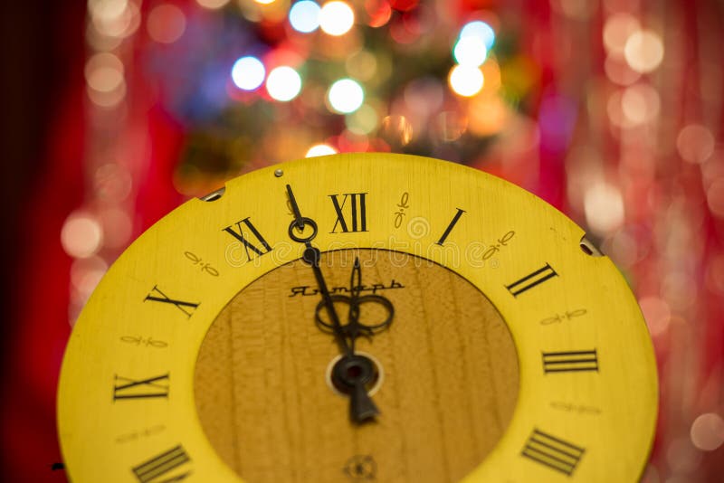 Clock on Christmas Lights Background Editorial Stock Image - Image of ...