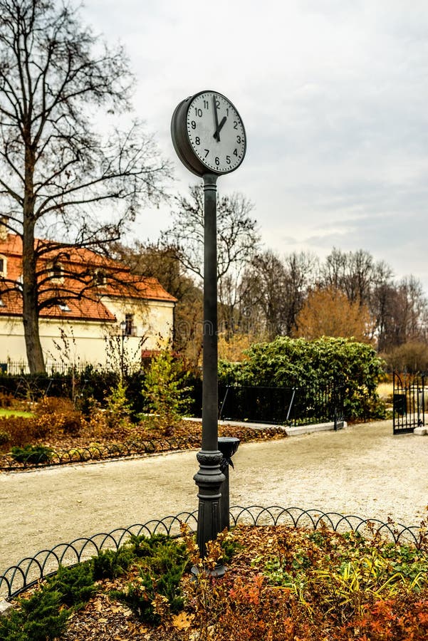 Clock in city park stock photo. Image of famous, flowers - 63342436