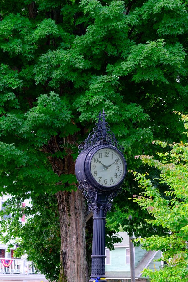 Clock in City Park Square stock image. Image of clock - 269272469