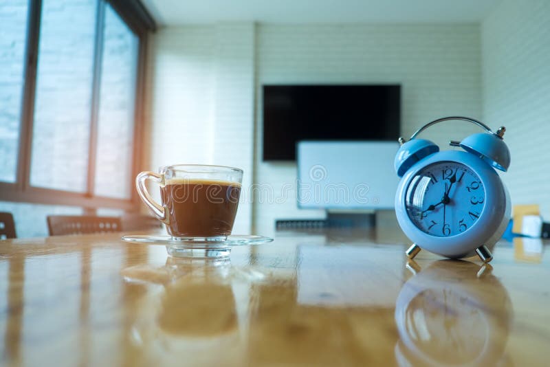 Clock and Coffee on Table in Meeting Room. Stock Image - Image of time ...