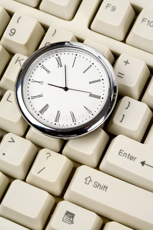Clock and Computer Keyboard Stock Photo - Image of control, urgency ...