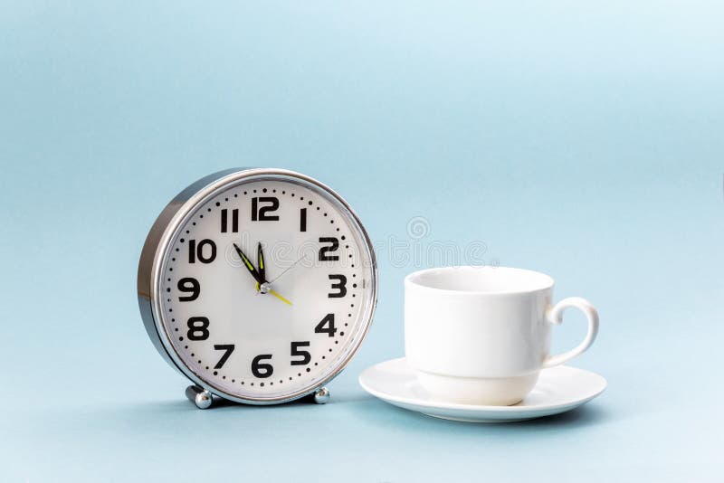 Clock and cup stock image. Image of time, space, beverage - 130471565