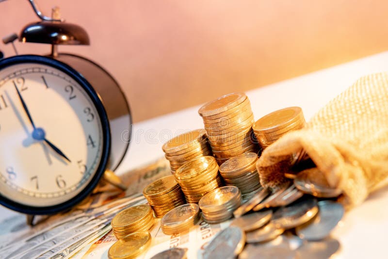 Clock and Currency on Table, Time Investment Concept Stock Image ...