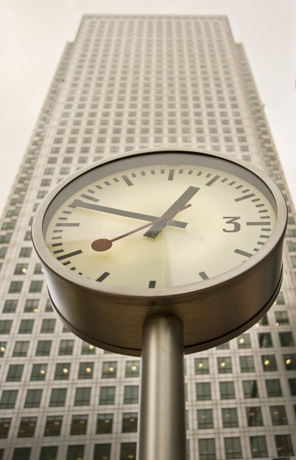 Clock Detail in Front of Skyscraper Stock Image - Image of building ...