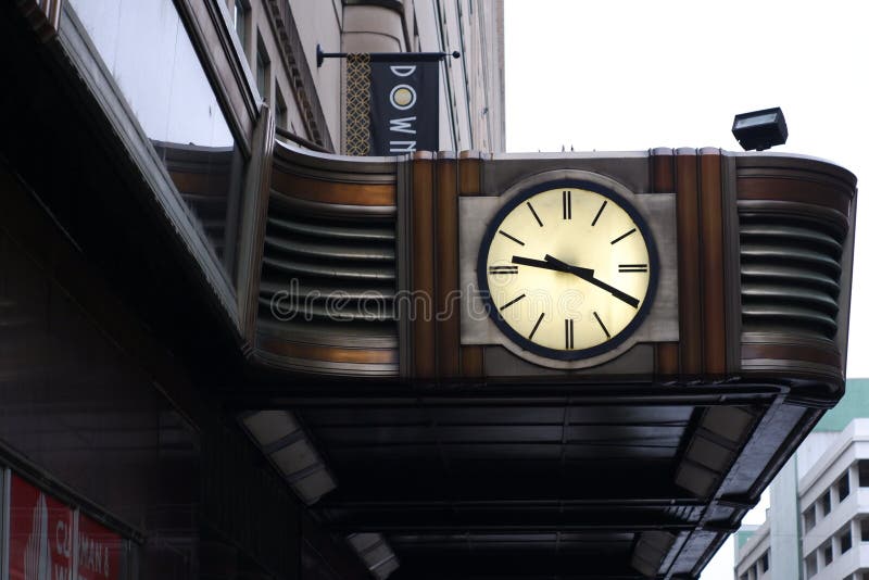 Clock on Downtown Historic Building Overhang Stock Image - Image of ...