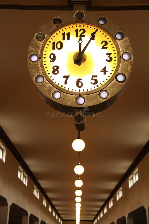 Clock in factory hall stock image. Image of hour, luminosity - 10625341