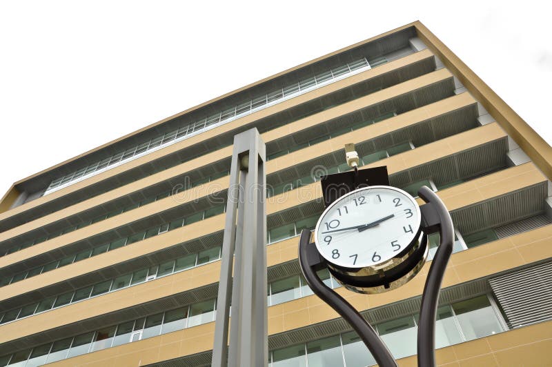 Clock in front of building stock image. Image of column - 20334575