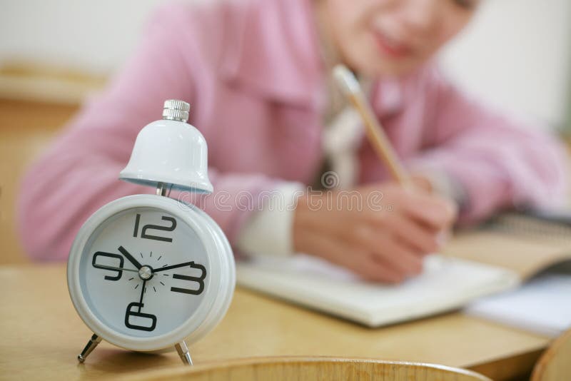 Clock with Girl in Class Room Stock Photo - Image of second, people ...
