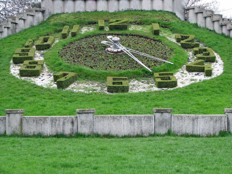 Clock of grass stock photo. Image of eleven, nine, four - 30606586