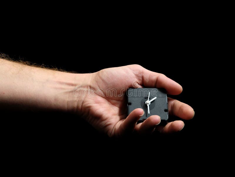 Clock and an Hand stock image. Image of trap, morning - 246959921